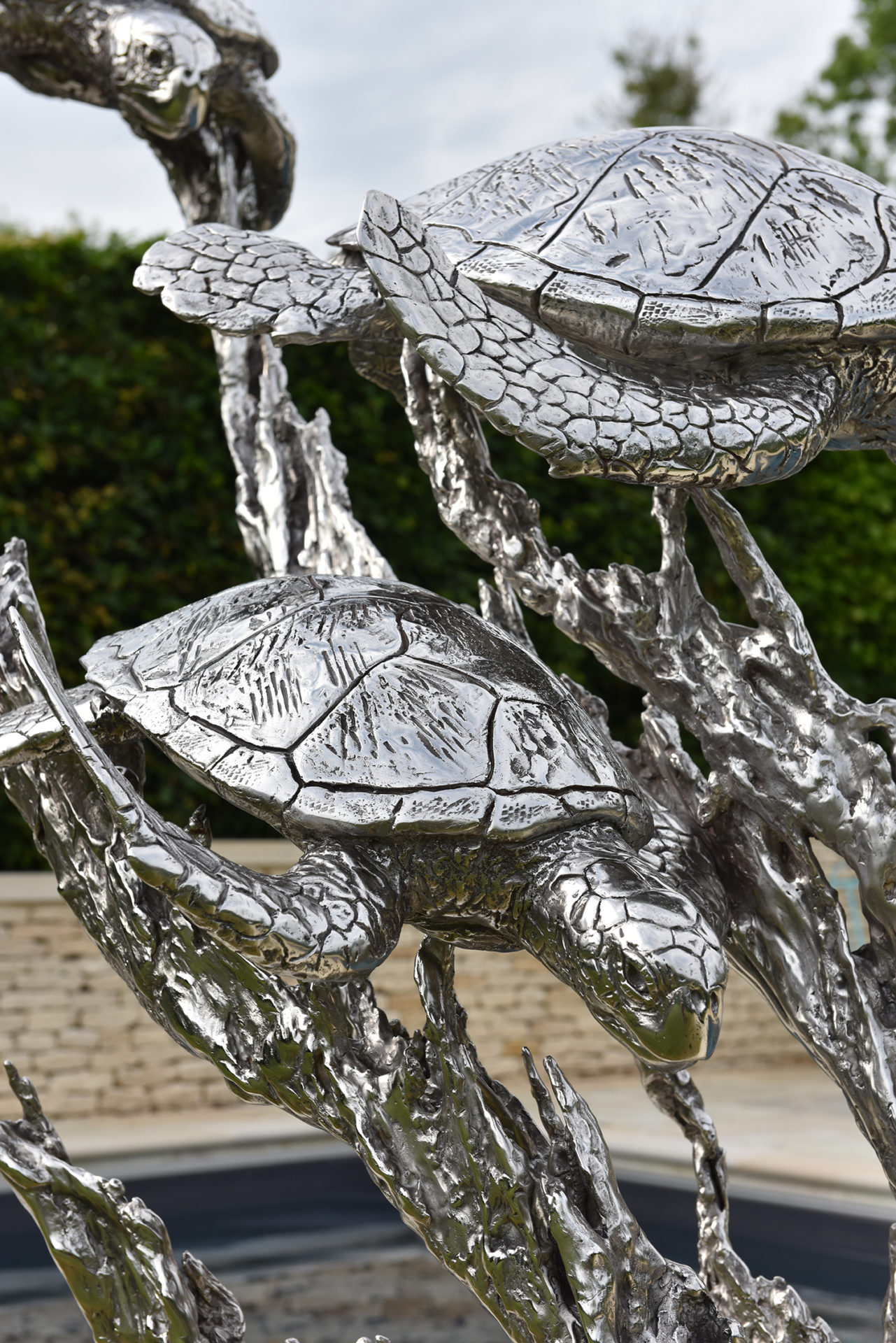 Turtles sculpture in stainless steel by Hamish Mackie